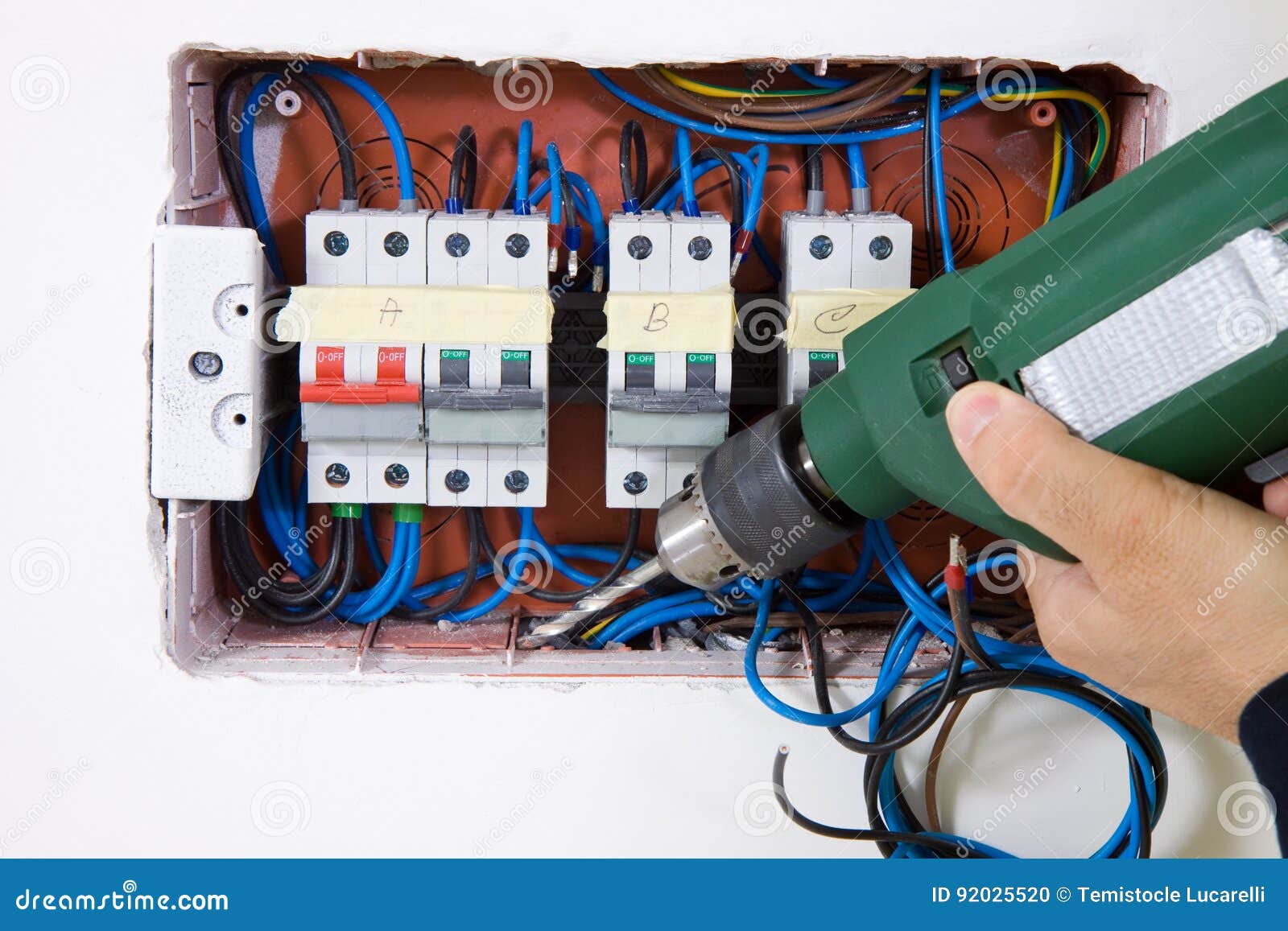Fixing an electric plant stock photo. Image of professional - 92025520