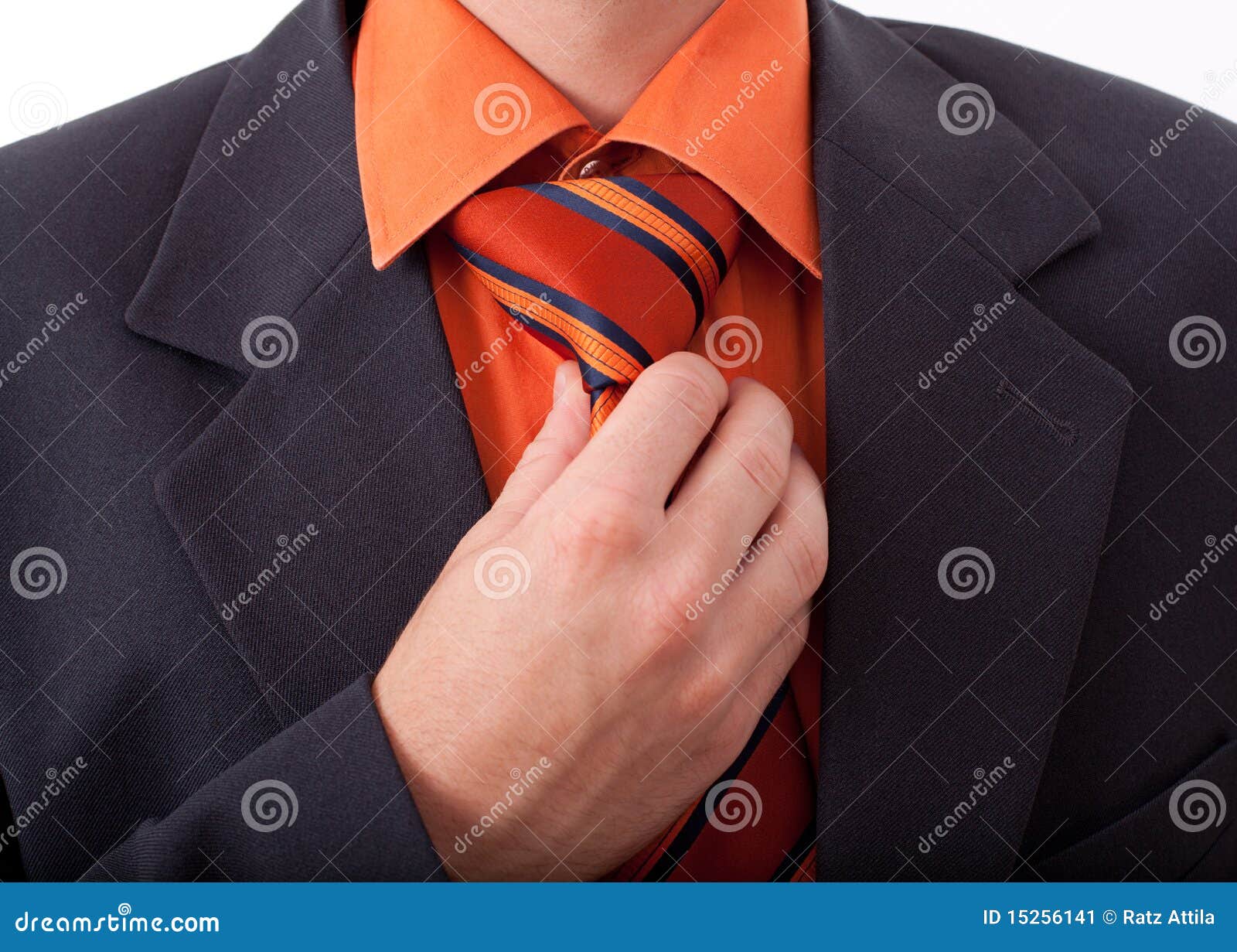 Fixing his tie stock image. Image of posed, clothing - 15256141