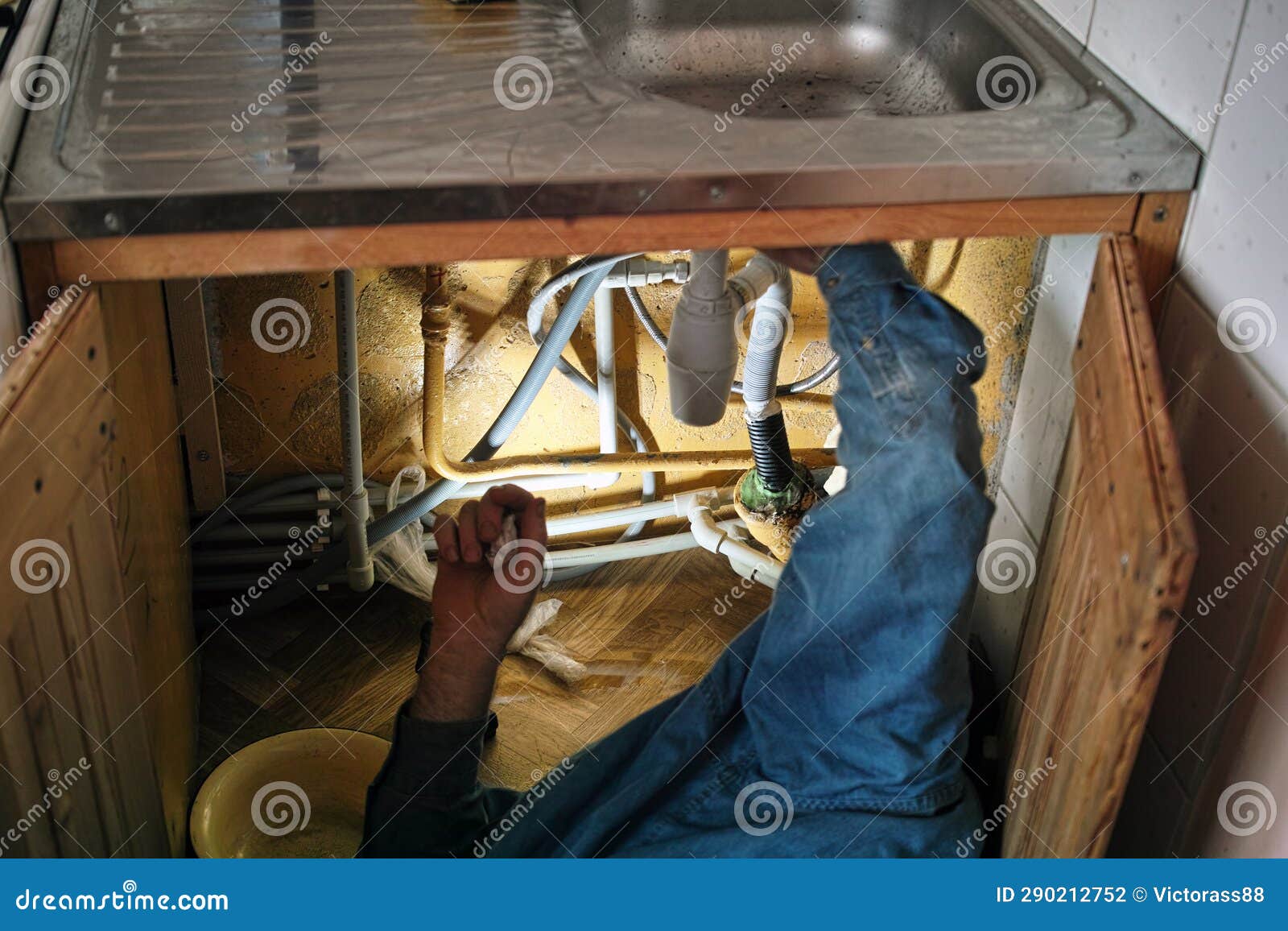 Fixing kitchen leak stock photo. Image of sewer, faucet - 290212752