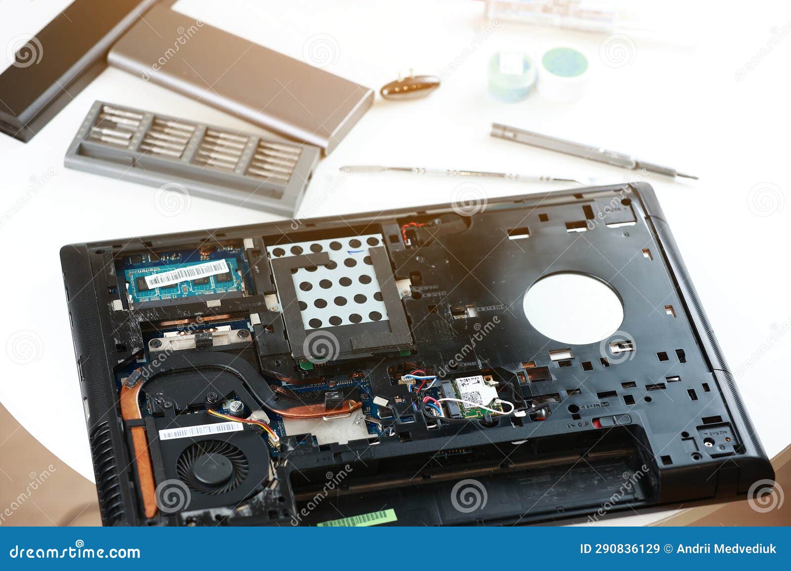 Fixing Laptop. Repairman Holds Cooling Fan and Repairs from Overheating ...