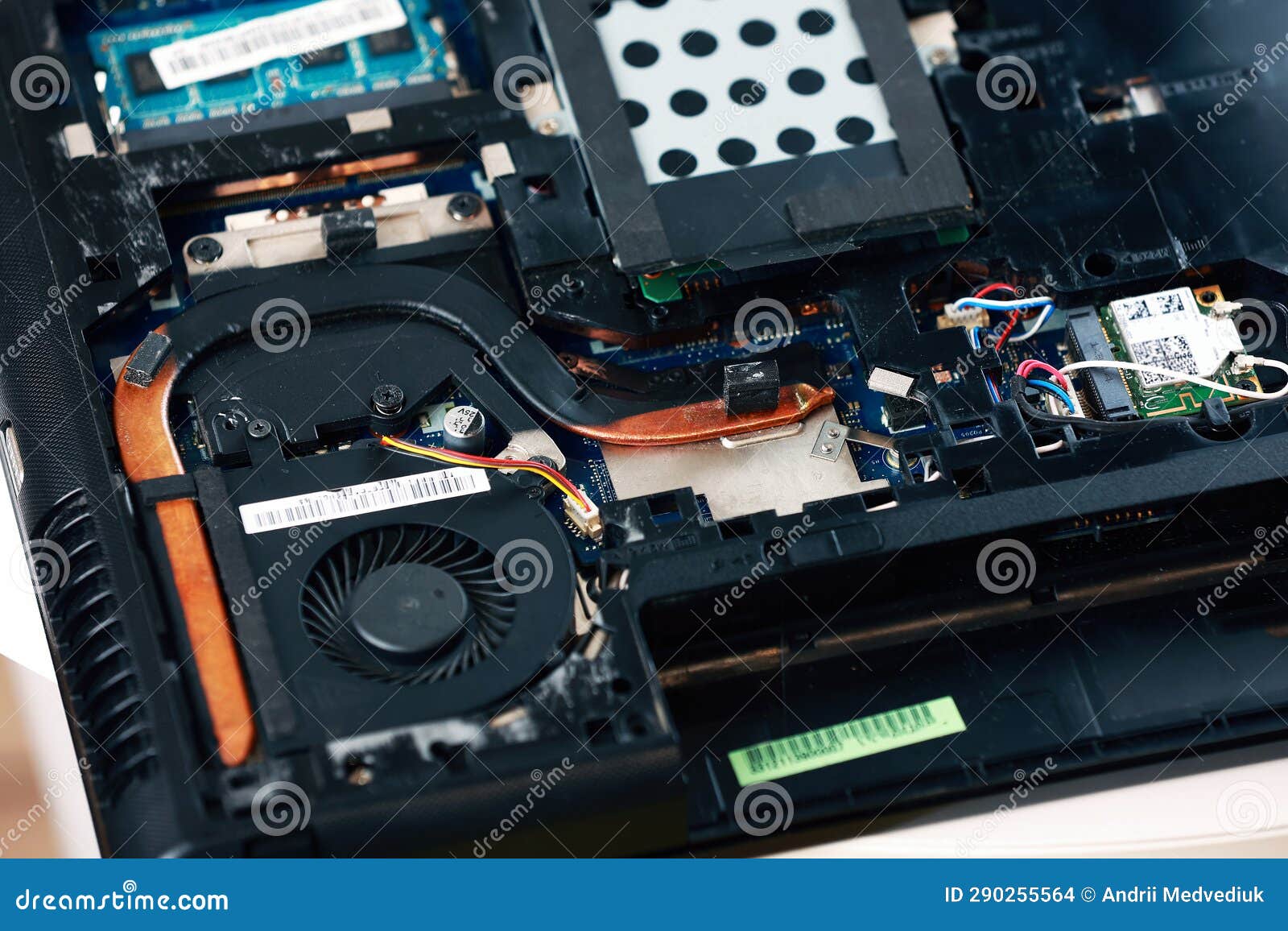 Fixing Laptop. Repairman Holds Cooling Fan and Repairs from Overheating ...