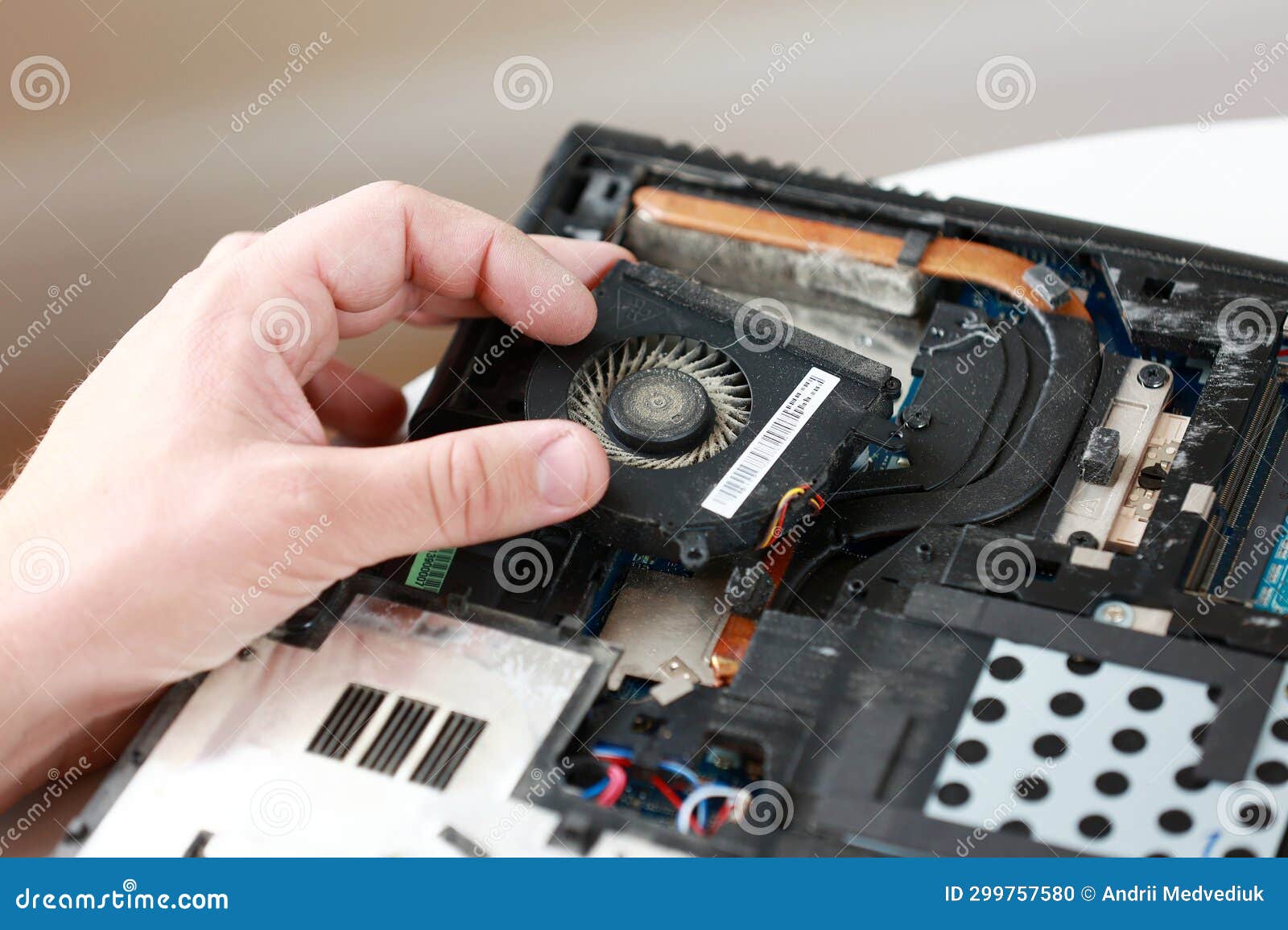 Fixing Laptop. Repairman Holds Cooling Fan and Repairs from Overheating ...