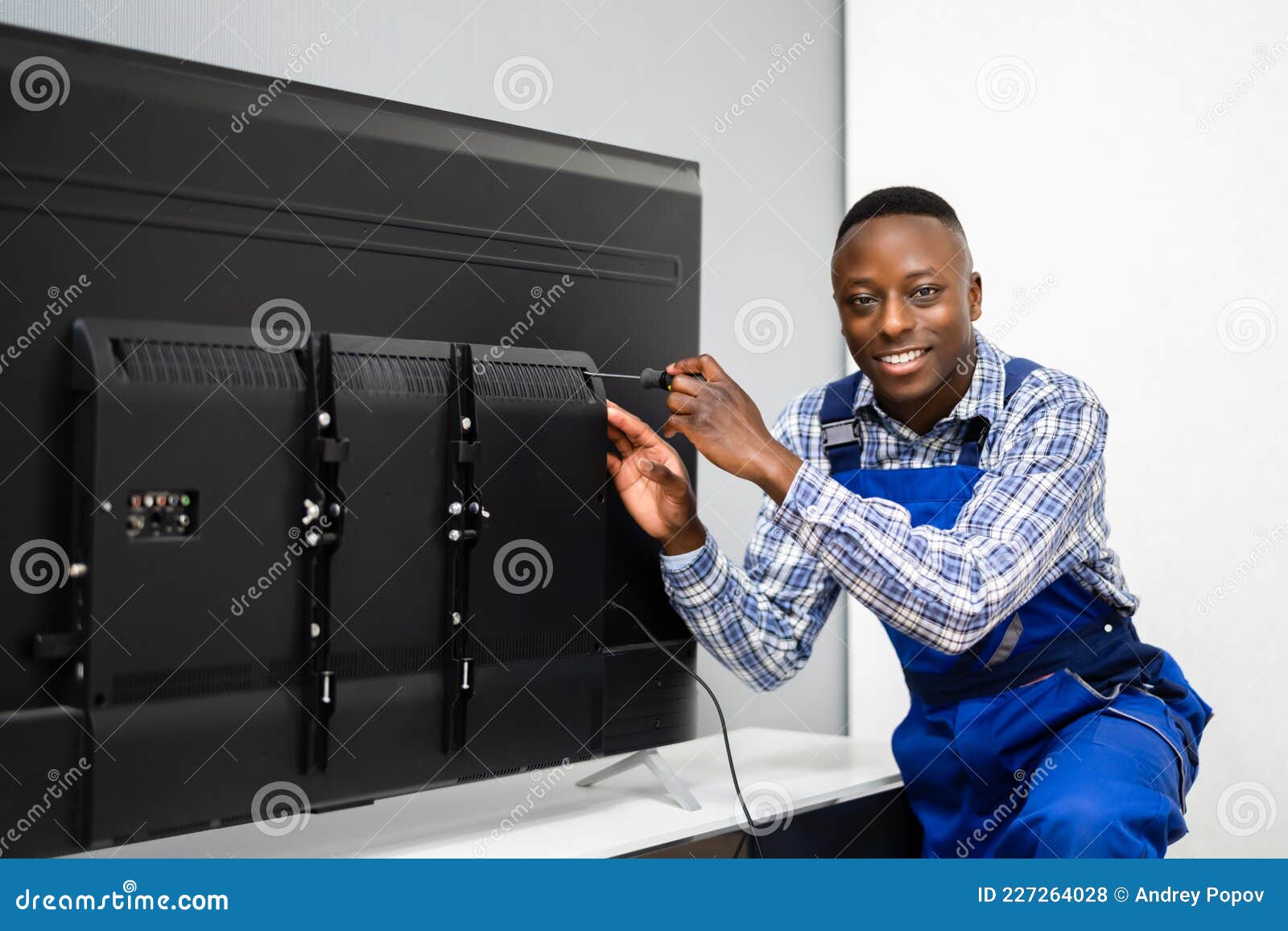 Fixing LCD Television. TV Checking Stock Photo - Image of repairman ...