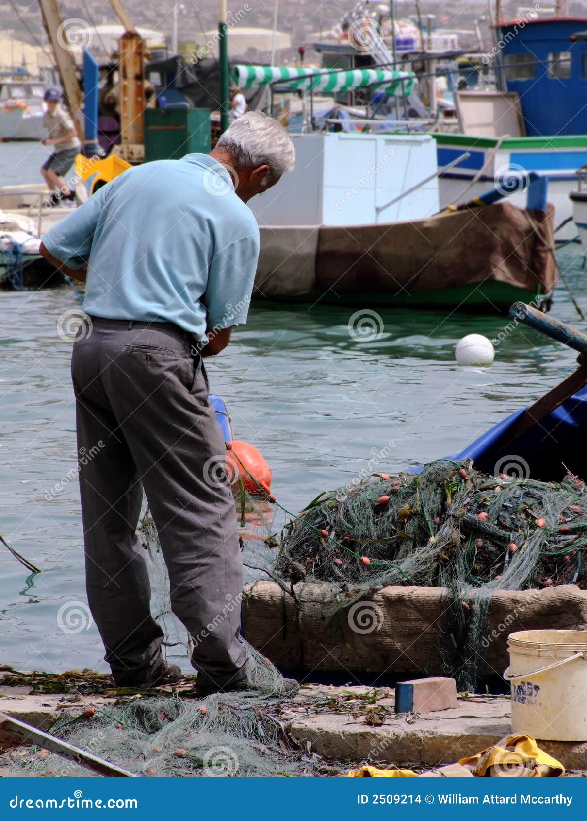Fixing the Net stock photo. Image of coast, chore, work - 2509214