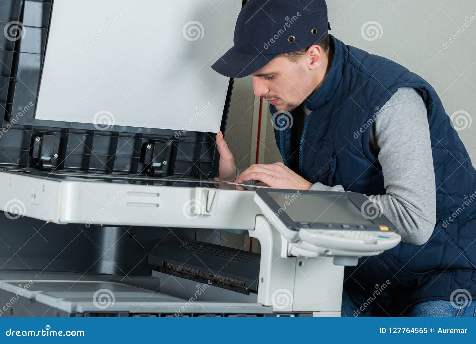 Fixing an office printer stock image. Image of fixing - 127764565