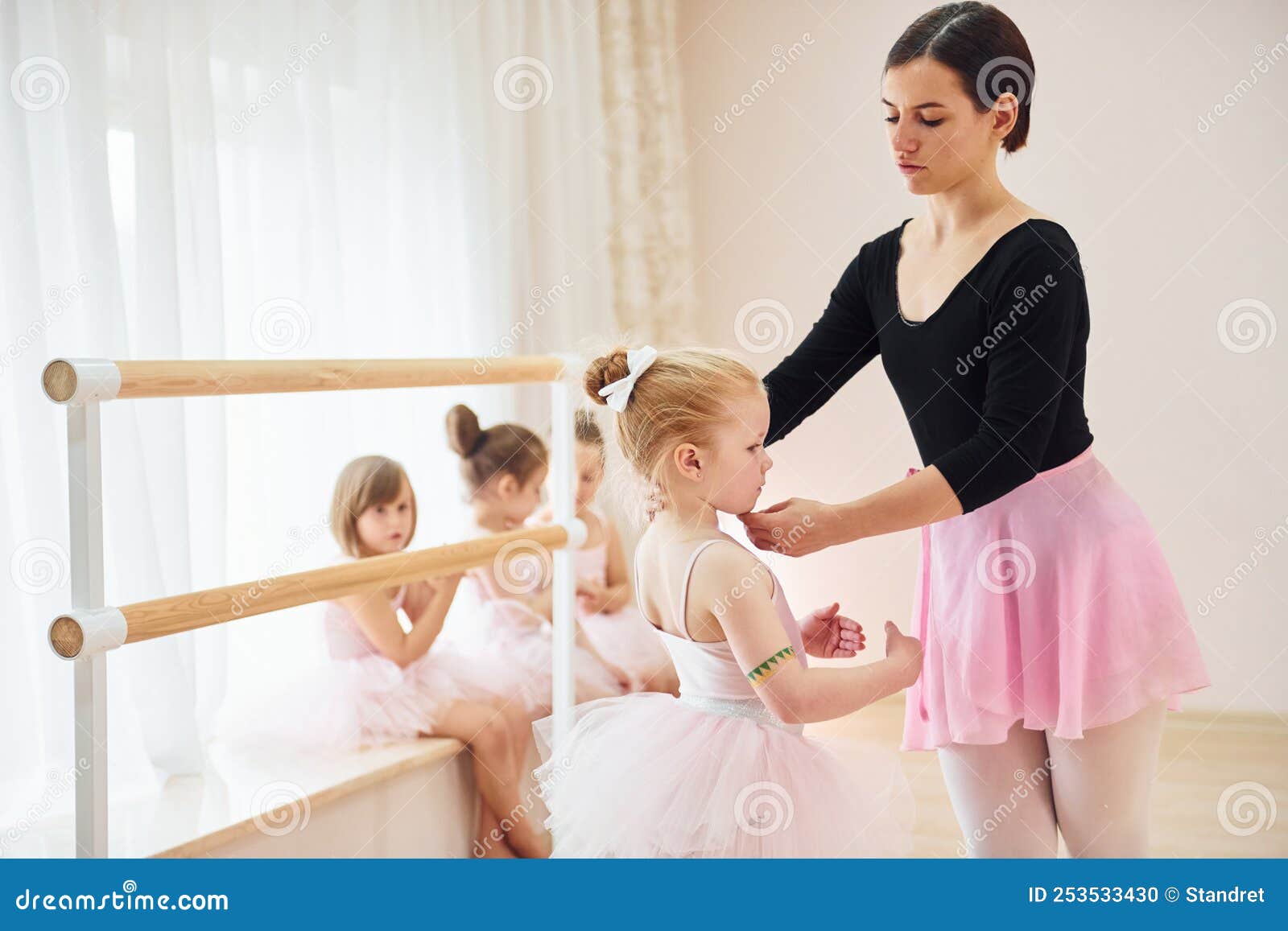 Fixing Posture. Little Ballerinas Preparing for Performance by Practicing Dance Moves Stock ...