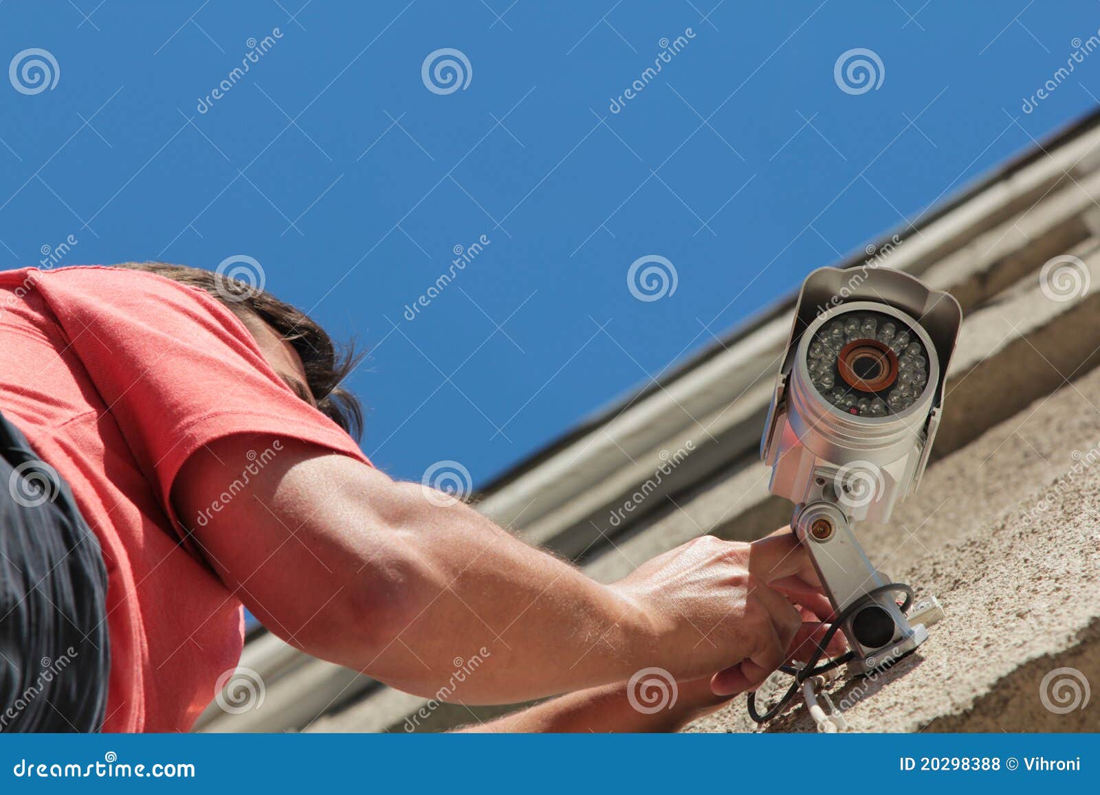 Fixing the security camera stock photo. Image of blue - 20298388