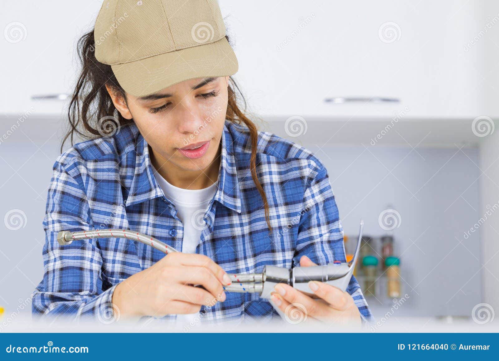 Fixing the tap connection stock photo. Image of manual - 121664040