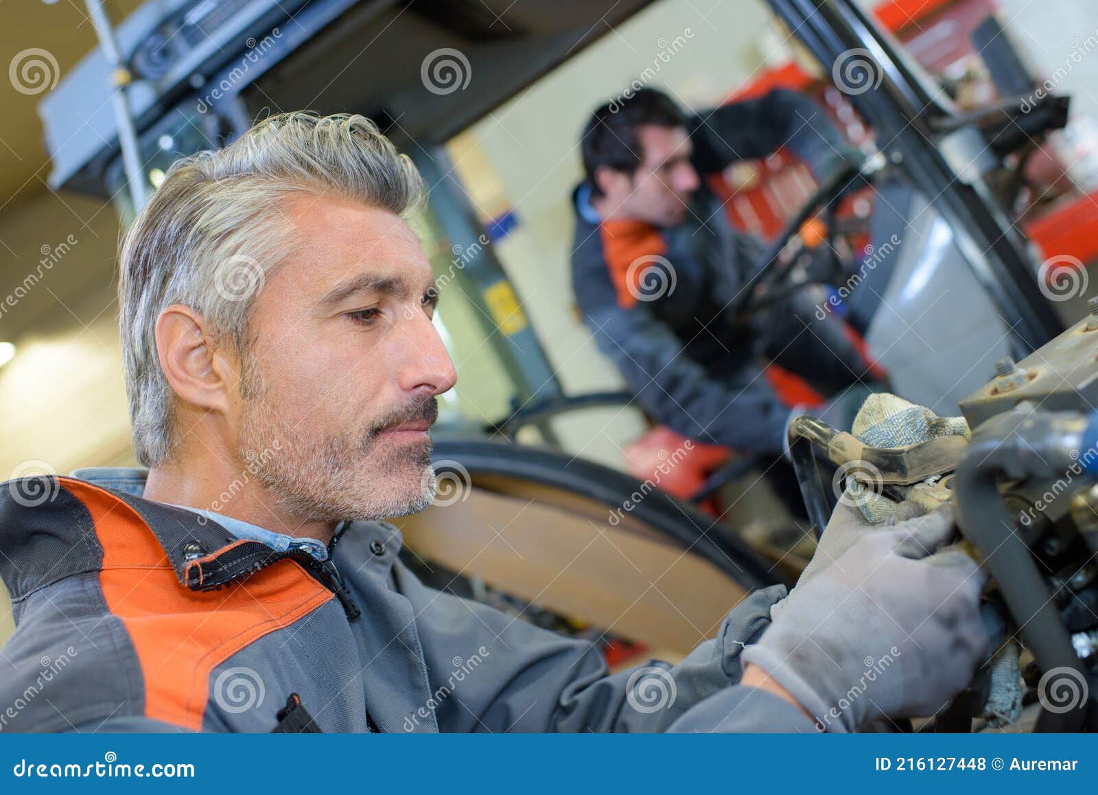 They fixing tractor stock photo. Image of protection - 216127448 They fixing tractor stock photo. Image of protection - 216127448