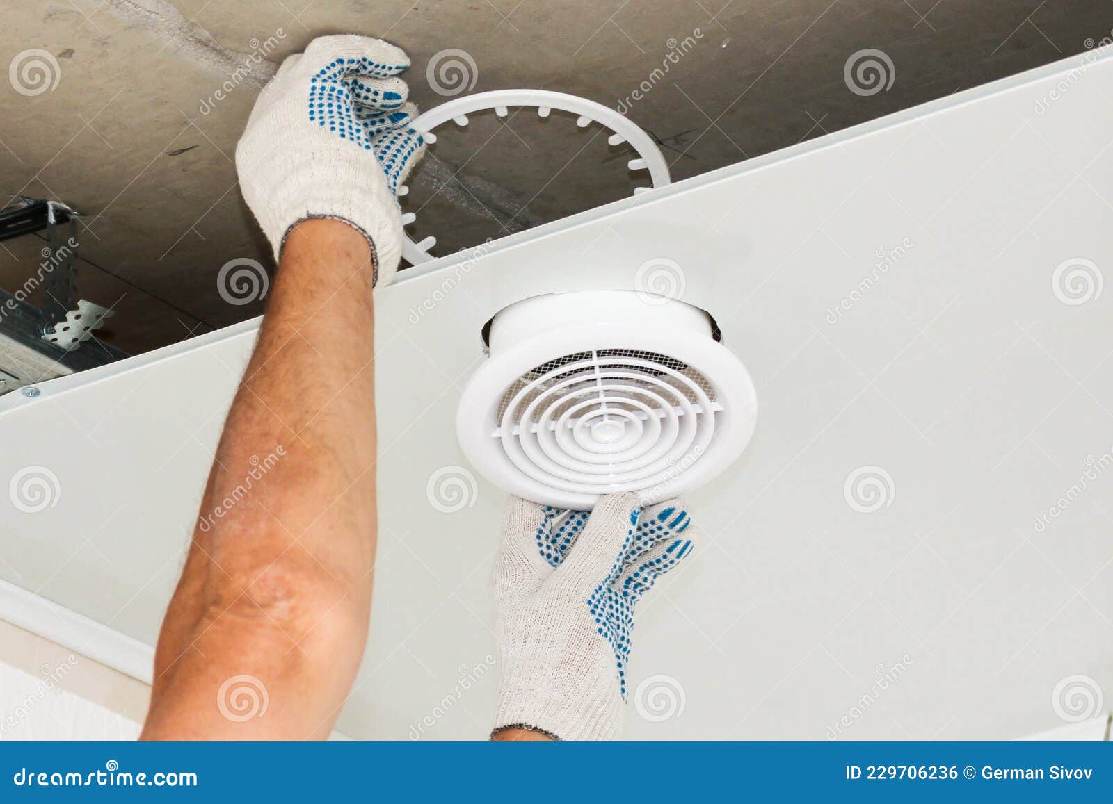 Fixing the Ventilation Diffuser in the Ceiling with a Ring Stock Photo ...