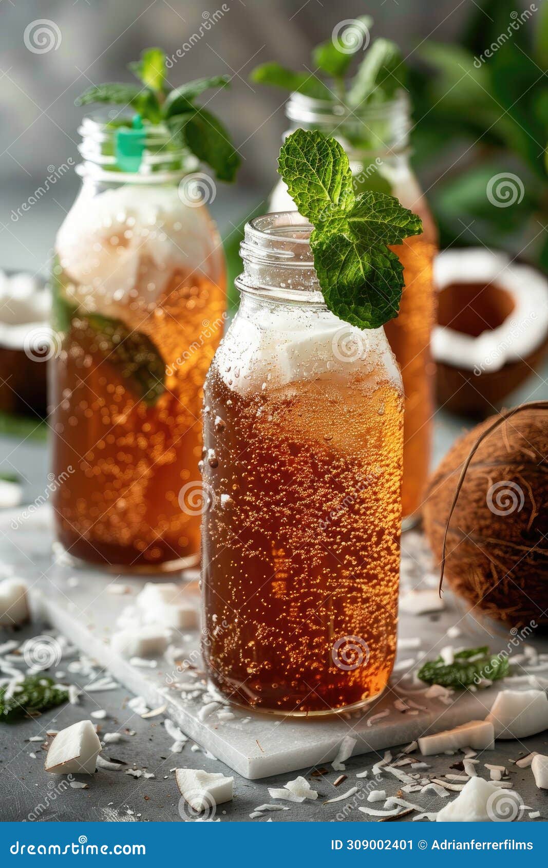 Fizzy Iced Tea with Coconut Pieces and Mint Garnish. Stock Image ...