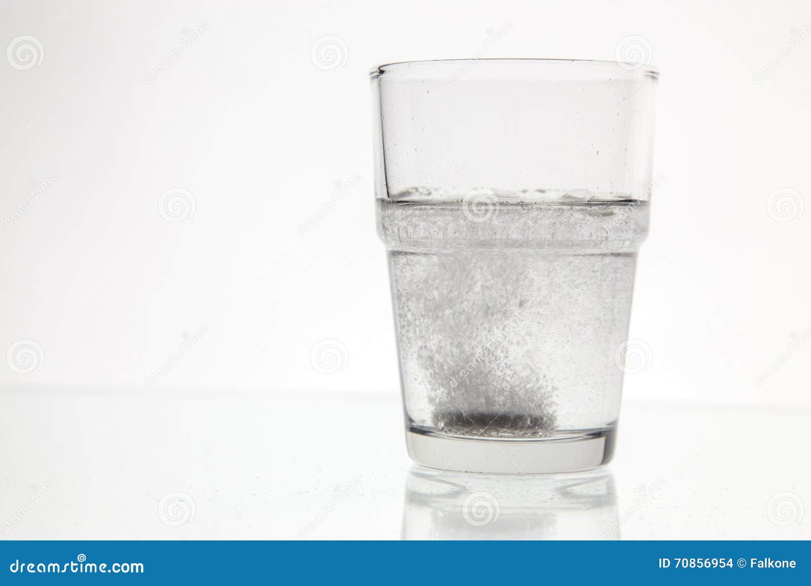Fizzy Tablet in Glass of Water Stock Photo - Image of shape, bubble ...