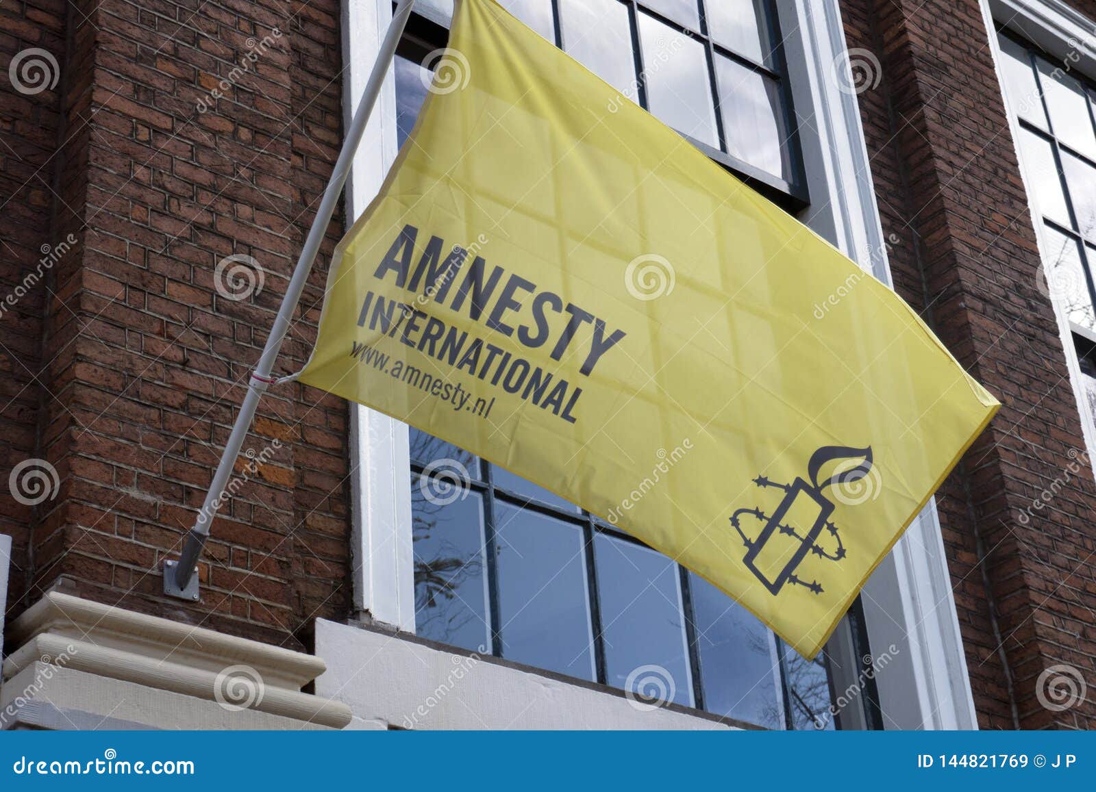 Flag of Amnesty International in Amsterdam Editorial Stock Image ...