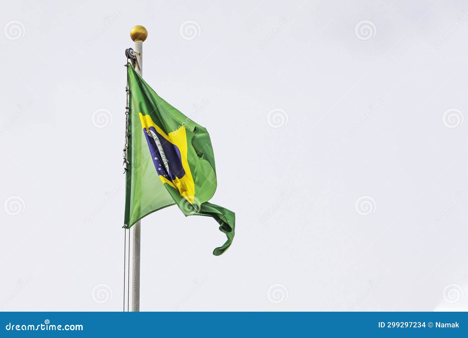 Flag of Brazil is Raised High in the Sky and Flutters Stock Photo ...