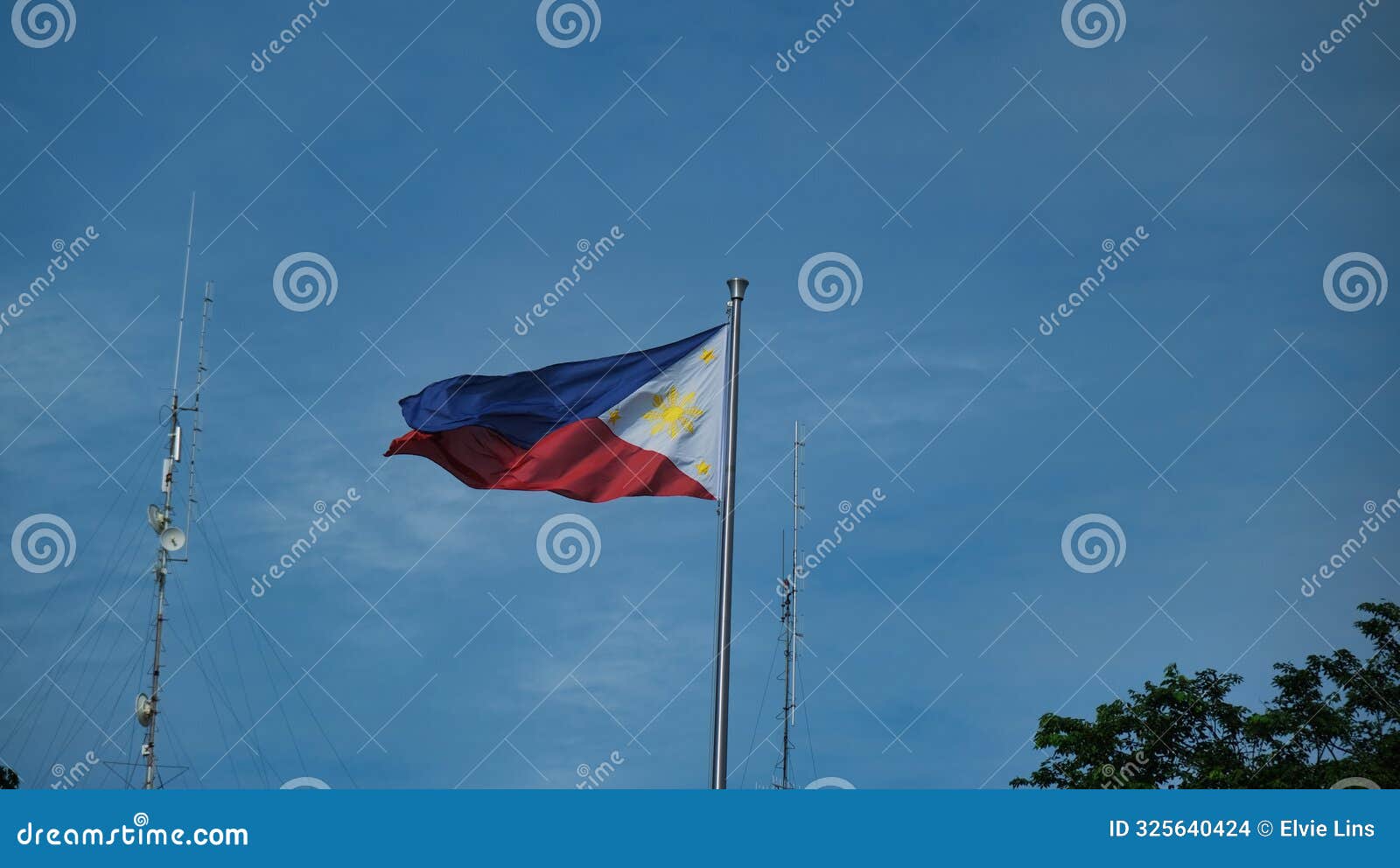 The Philippine Flag At The Background Of The Grassy Field At The Rizal ...