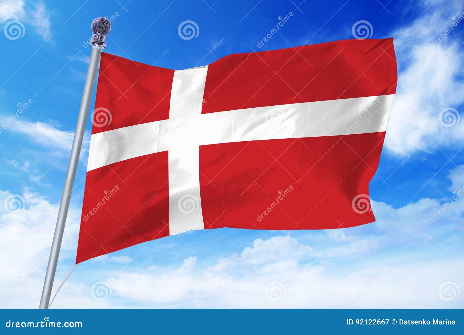 Flag of Denmark Developing Against a Clear Blue Sky Stock Image - Image ...