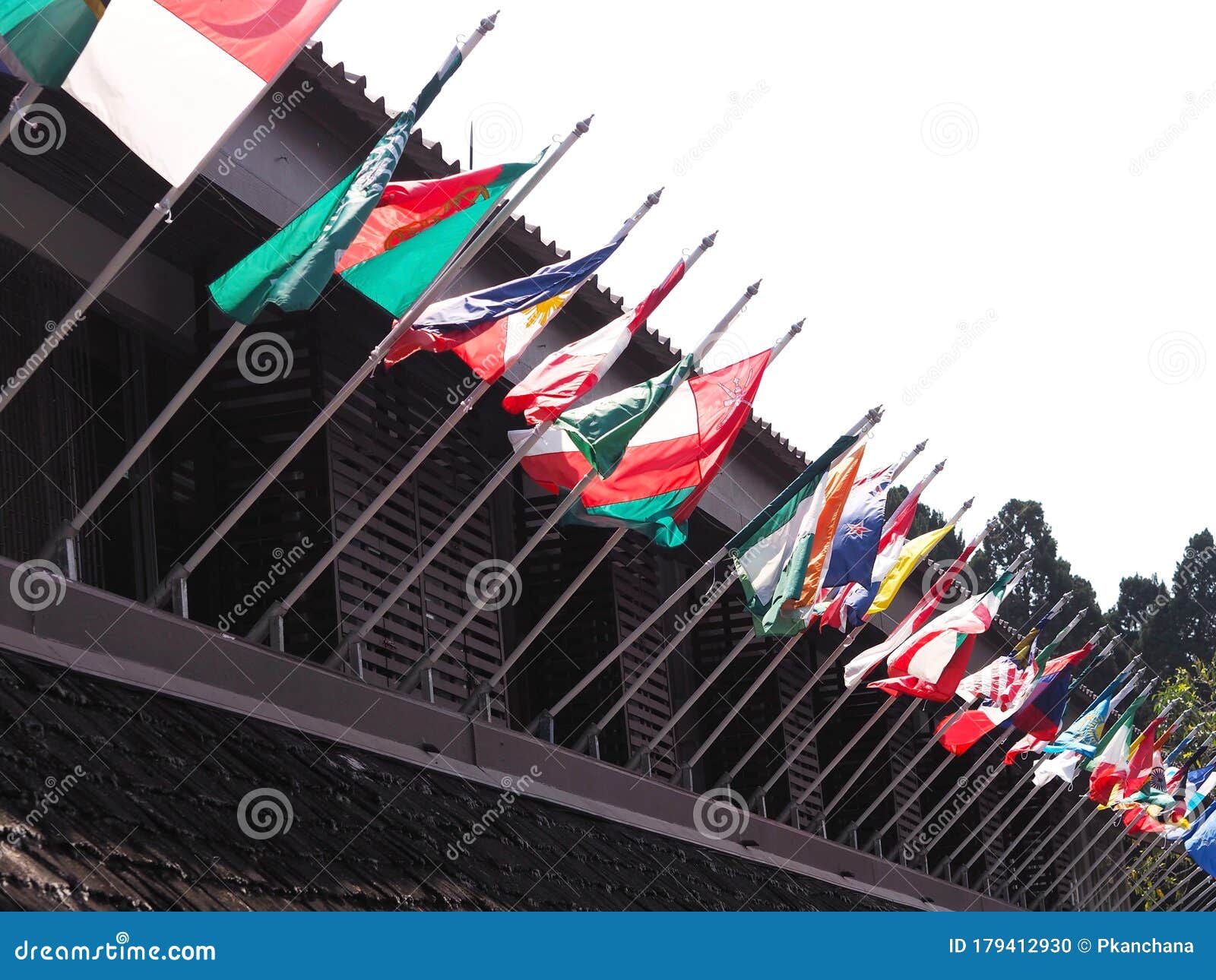 Flag of Different Countried Flying in the Wind Stock Photo - Image of ...