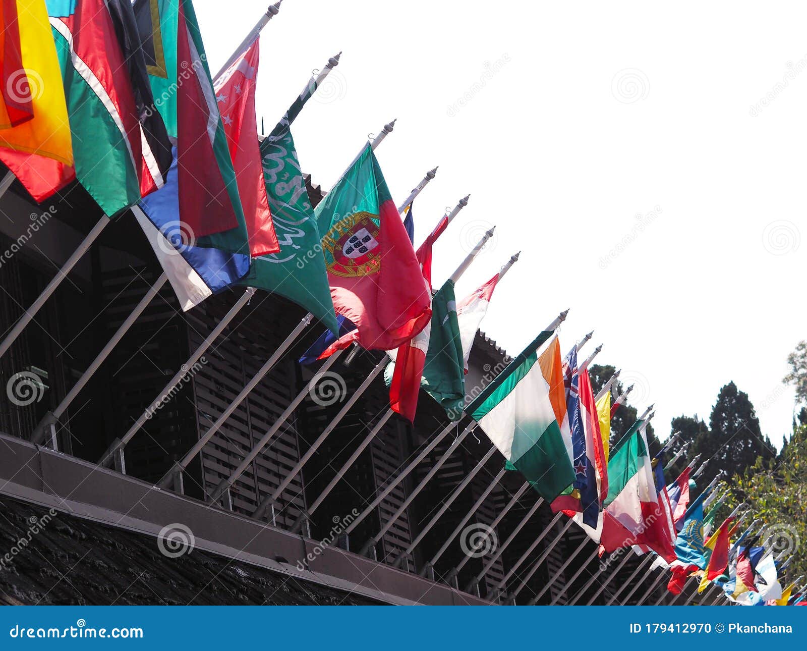 Flag of Different Countried Flying in the Wind Stock Photo - Image of ...