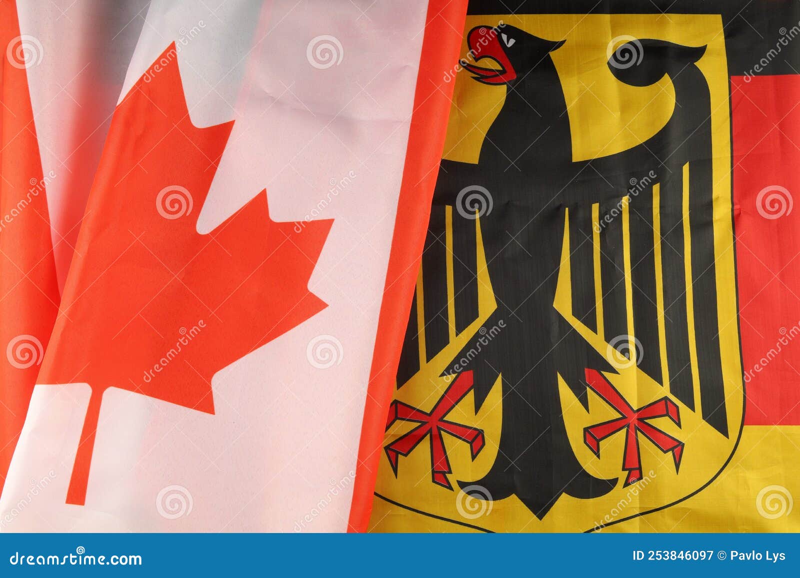 Flag of Germany and Canada stock image. Image of blowing - 253846097