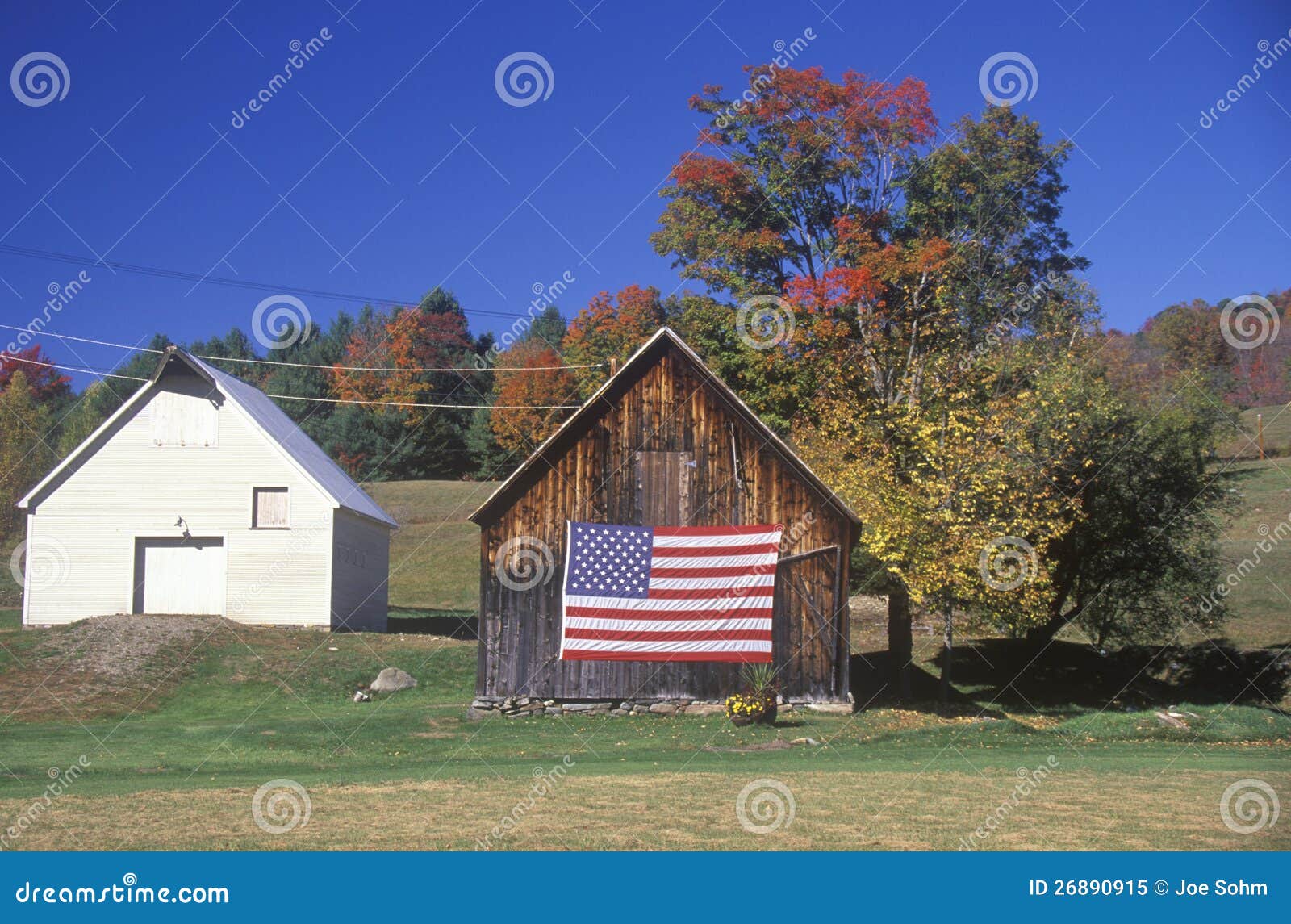 Flag Hung on an Old Barn stock image. Image of ranch - 26890915