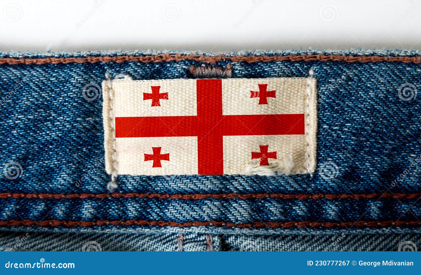 Flag on the label of jeans stock image. Image of official - 230777267