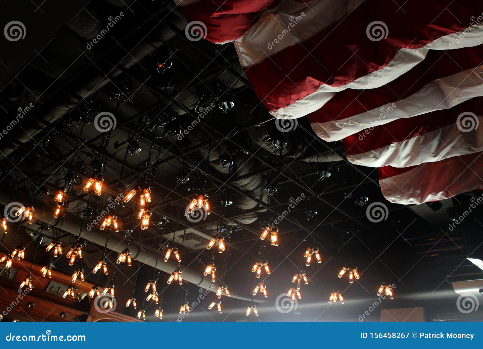 Flag and Lamps on Celiing stock image. Image of scrub - 156458267