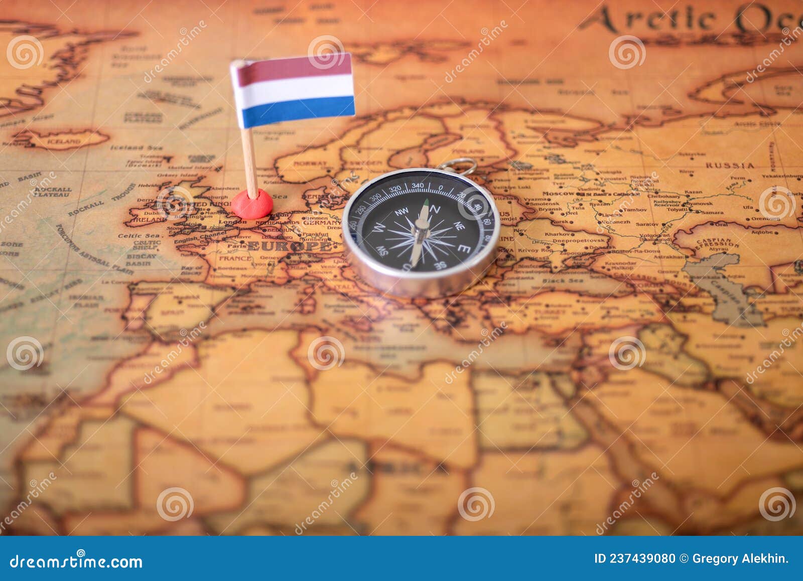 Flag of the Netherlands and Compass on the World Map Stock Photo ...