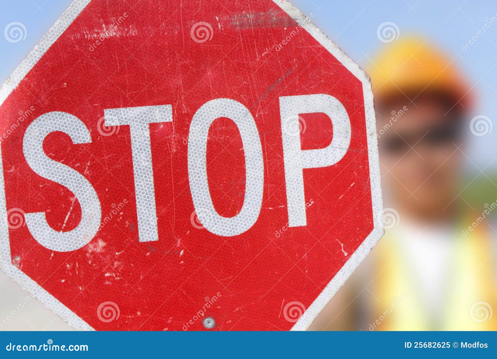 Flag Person Holds Stop Sign Stock Image - Image of drivers, road: 25682625