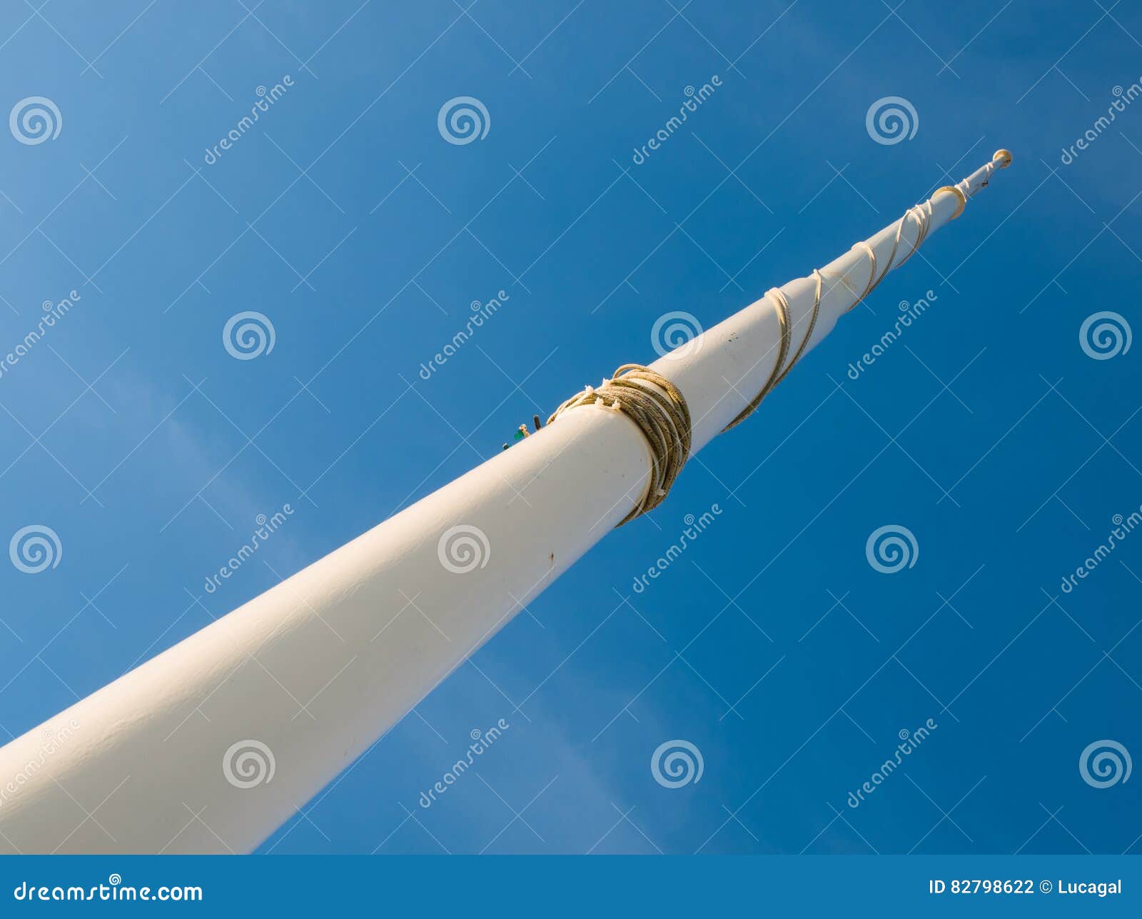 Flag Pole Pointed at the Blue Sky Seen from Below Stock Photo - Image ...