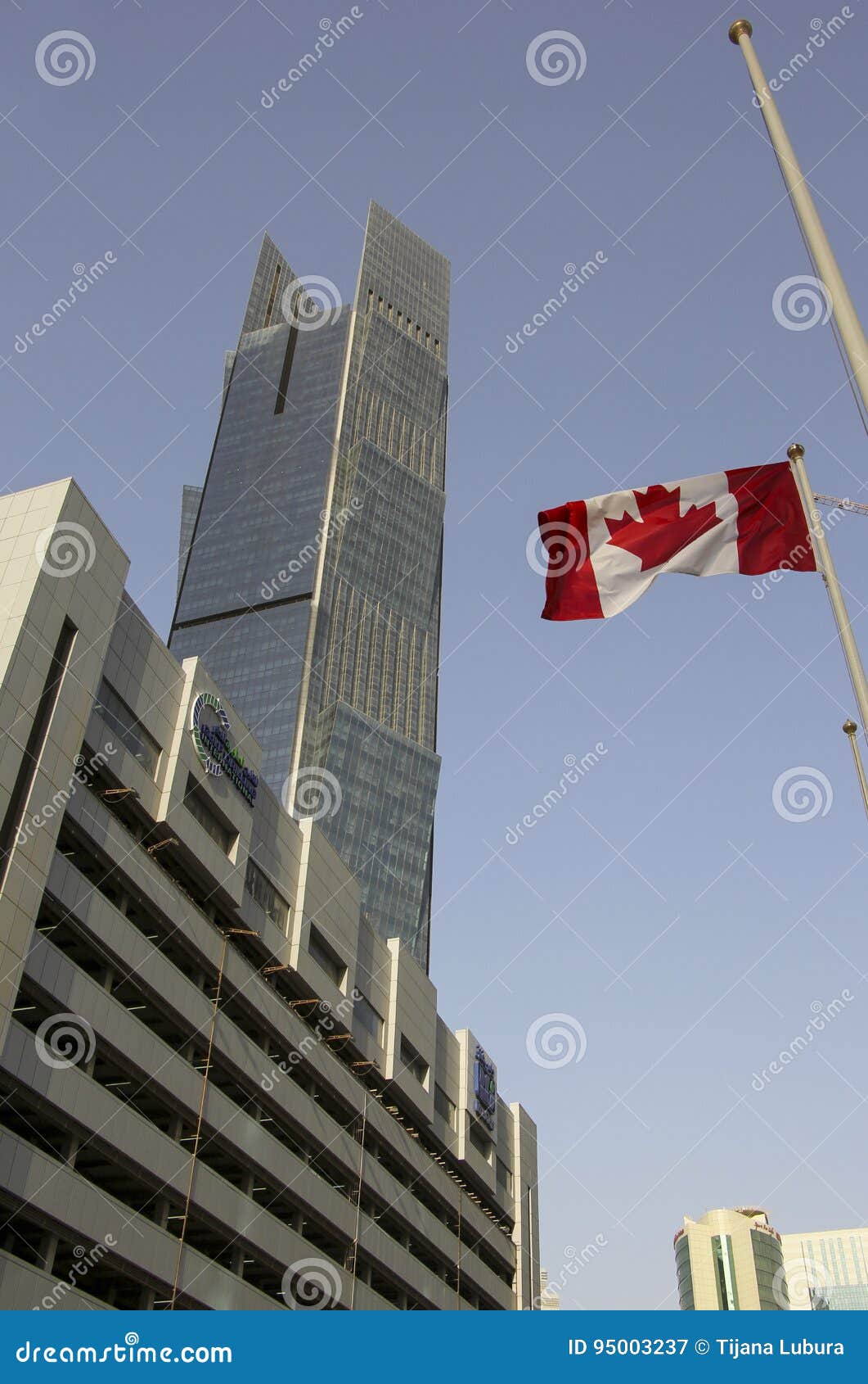 Flag of Qatar and Modern Buildings in Doha Editorial Photography ...