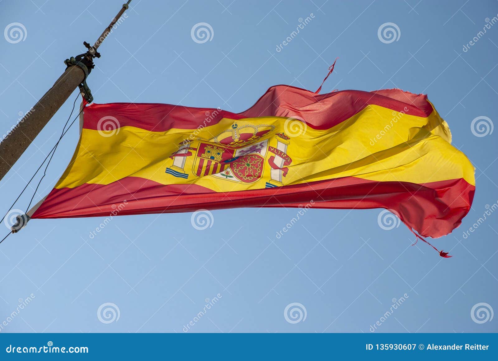 Flag of Spain on a pole stock image. Image of flag, iberian - 135930607