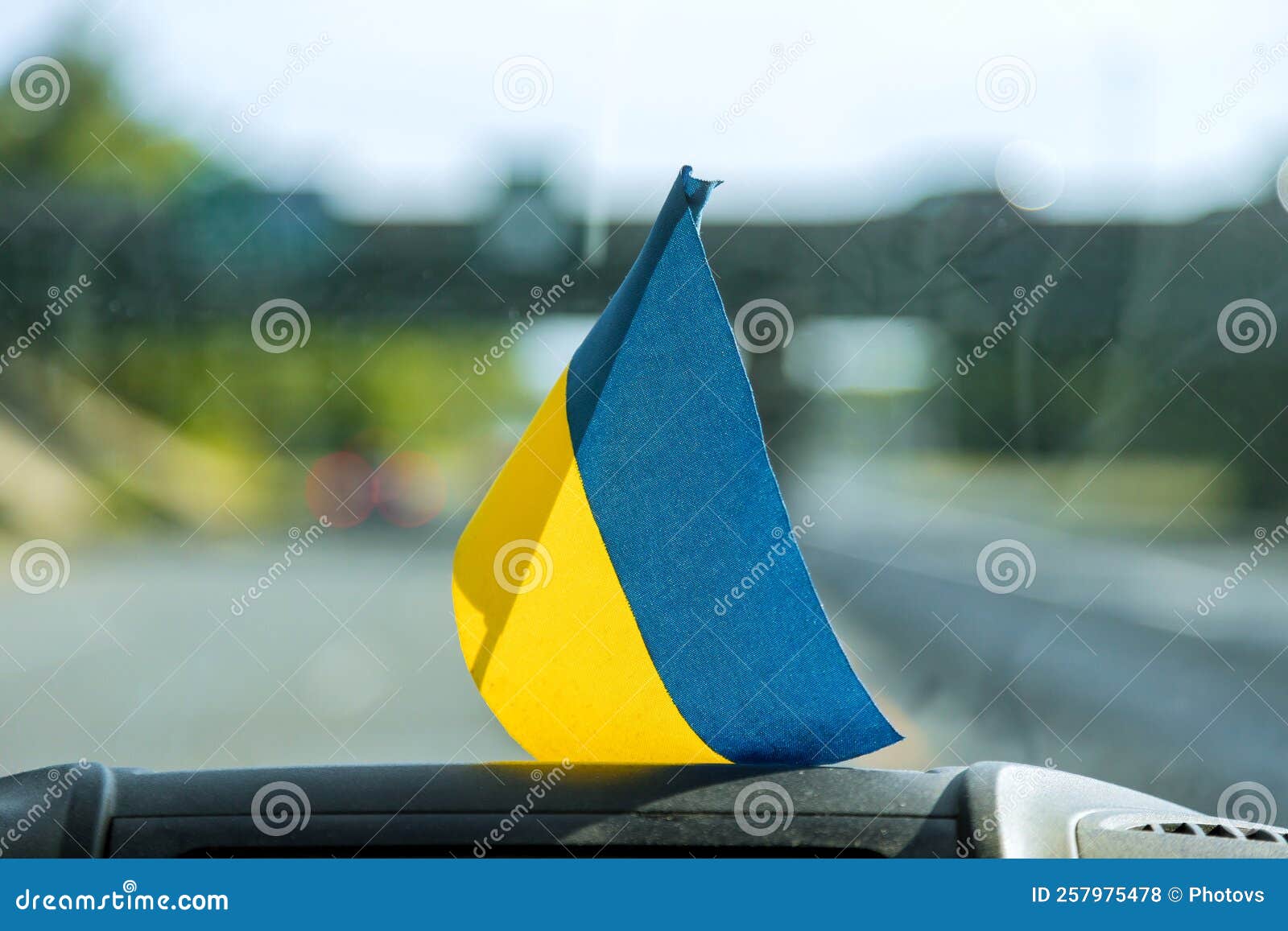 The Flag of Ukraine in the Car As a Sign of Support for Ukraine Stock ...