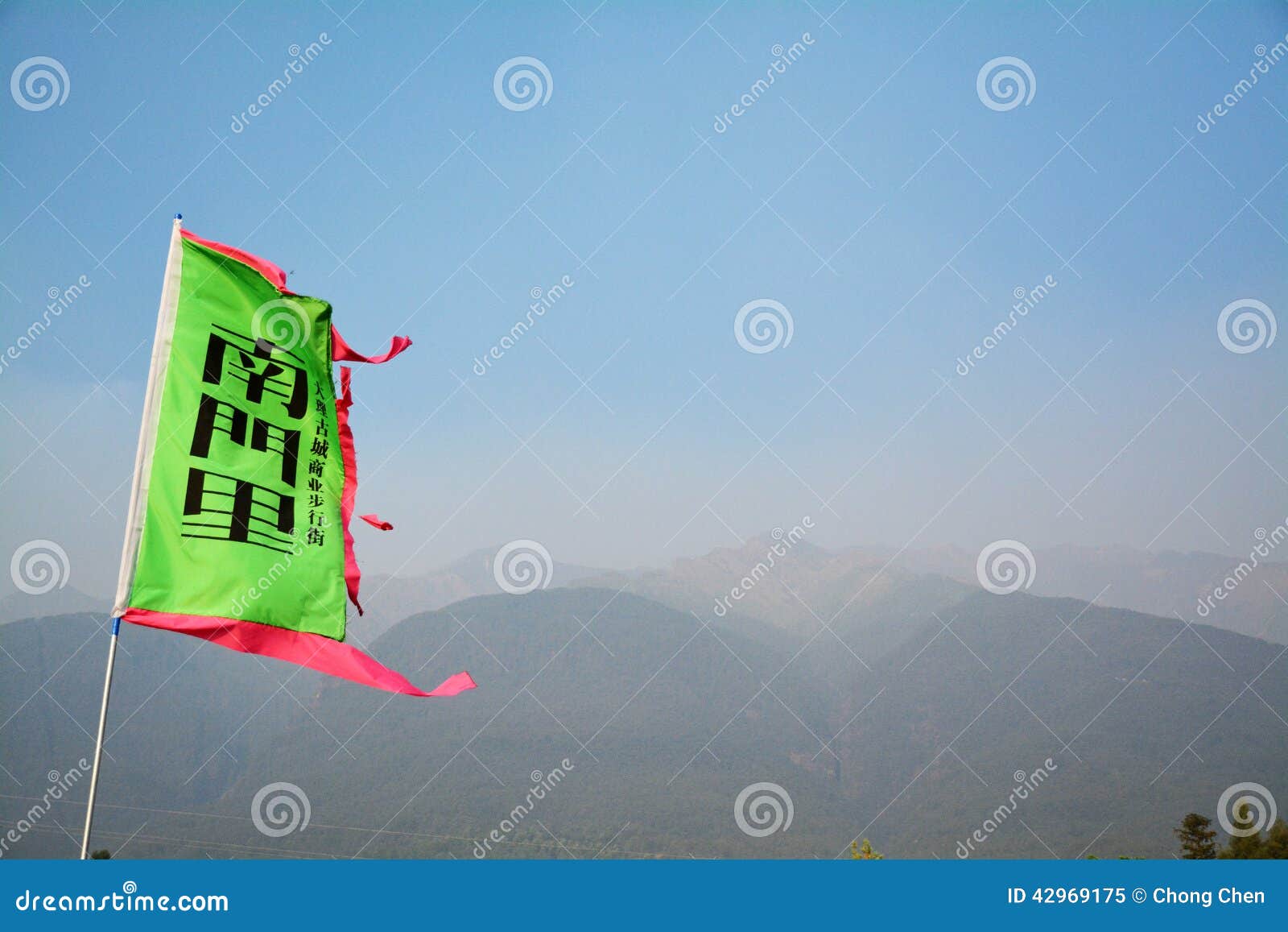 Flag on the Wall of Dali Old Ancient Town with Snow Mountains Editorial ...