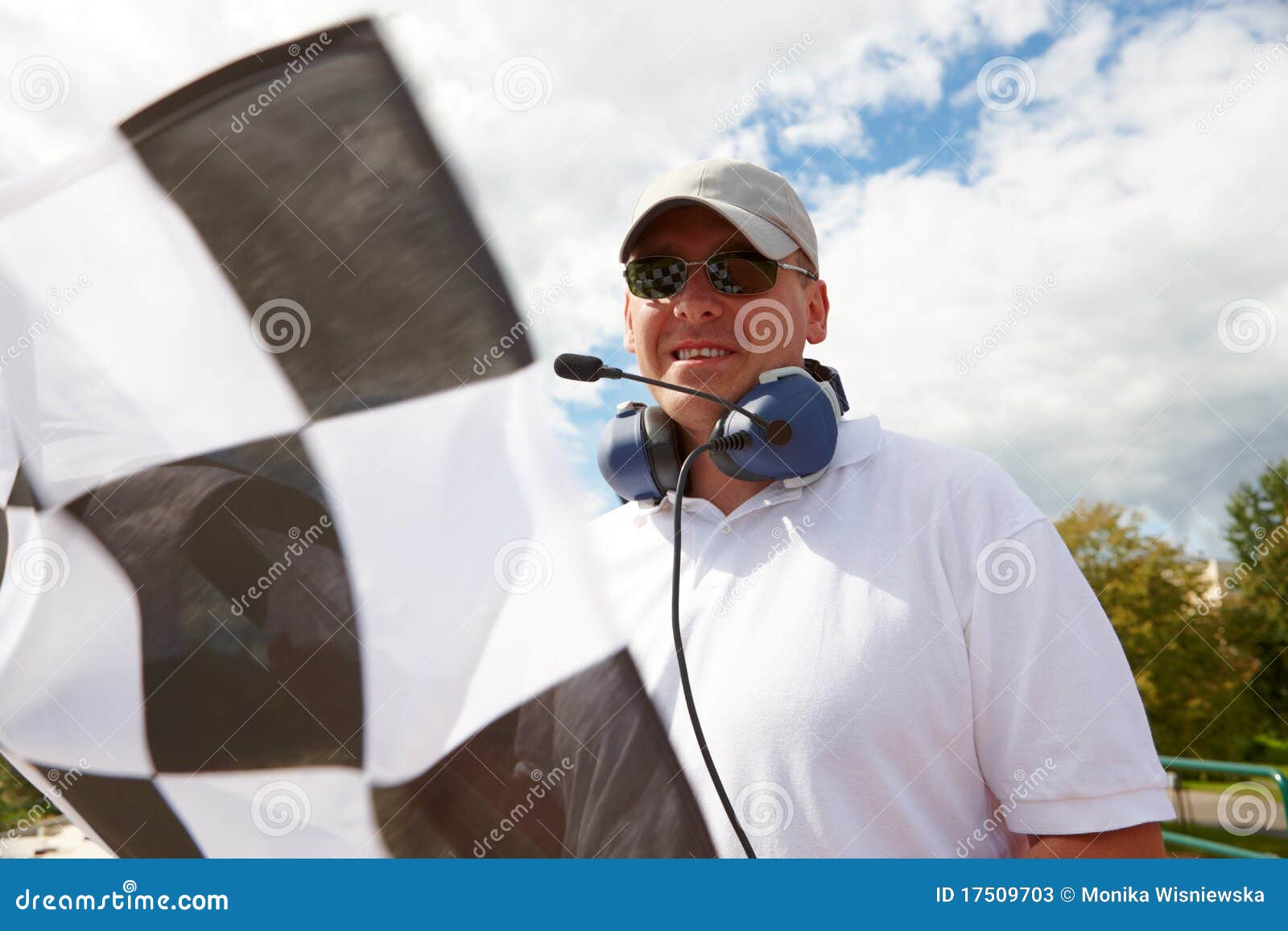 Flagman with Checkered Flag Stock Image - Image of outdoor, sunny: 17509703