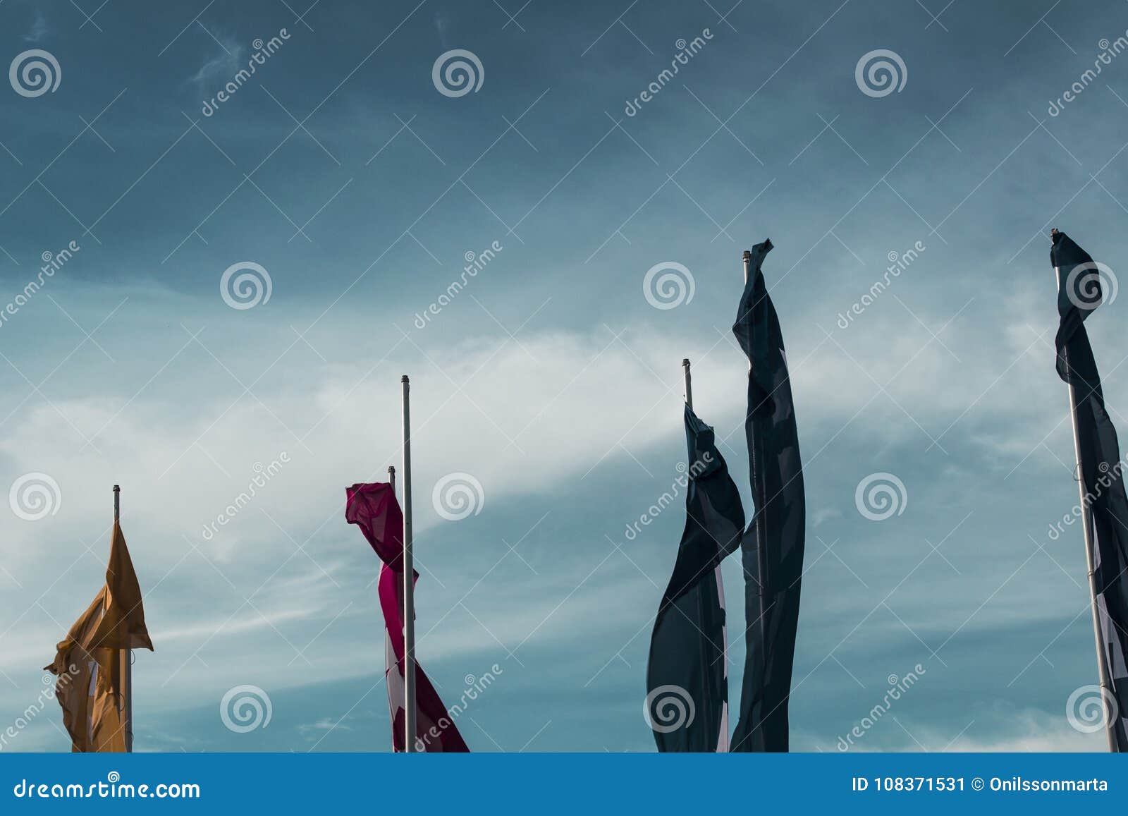 Flags blowing in the wind stock image. Image of country - 108371531