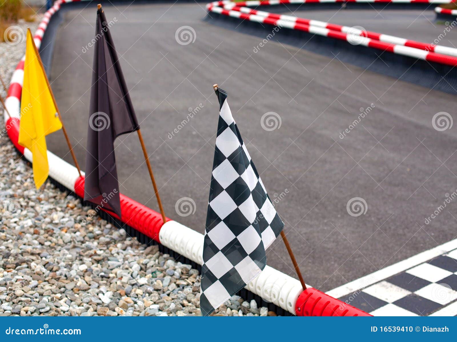 Flags on carting track stock photo. Image of cart, bend - 16539410
