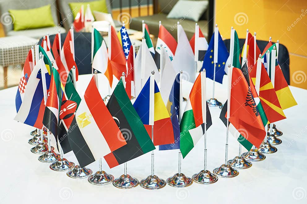 Flags of Countries of World on Negotiating Table Stock Photo - Image of ...