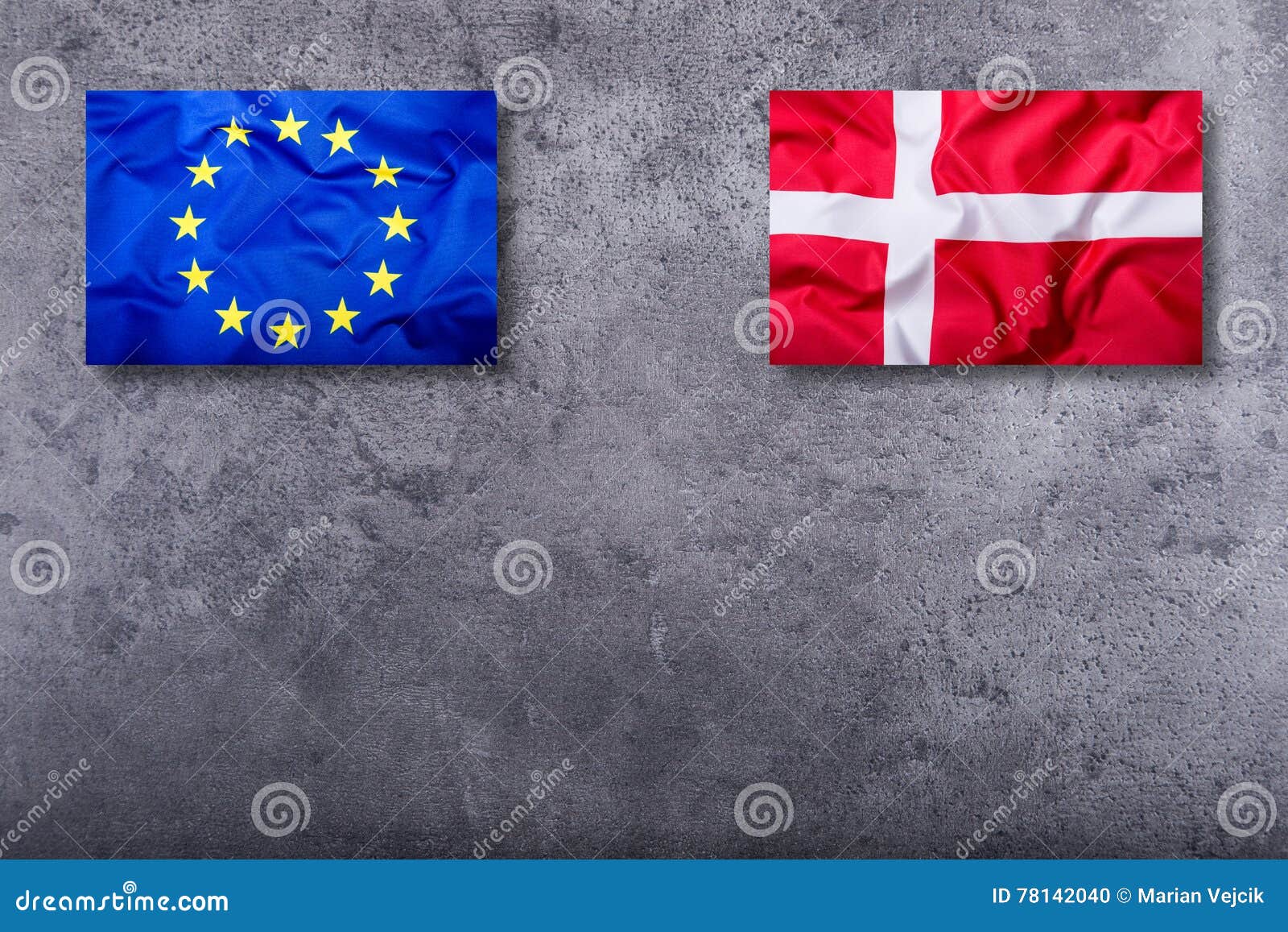 Flags of the Denmark and the European Union on Concrete Background ...