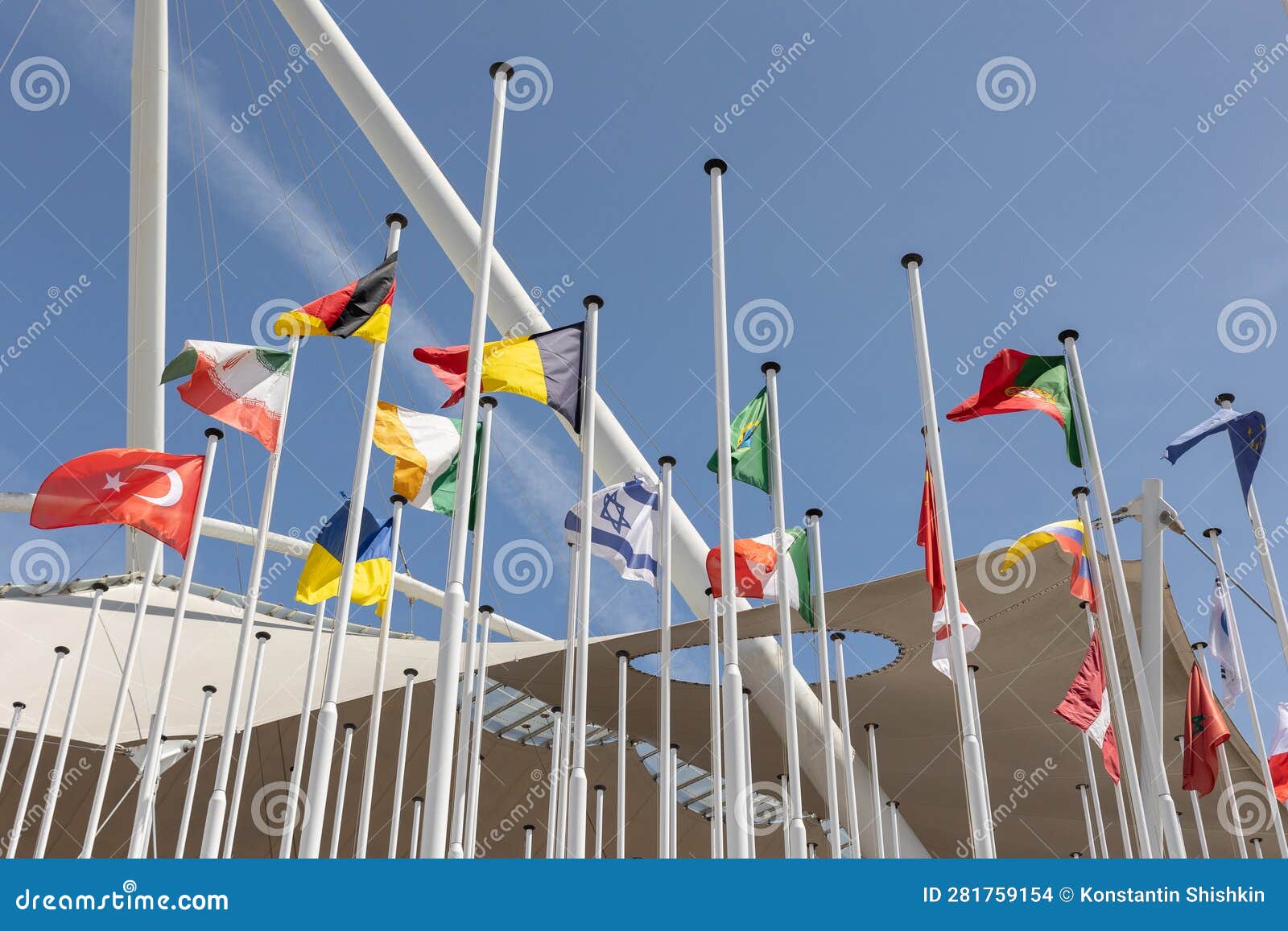 Flags of Different Countries at the Background of Blue Clear Sky Stock ...