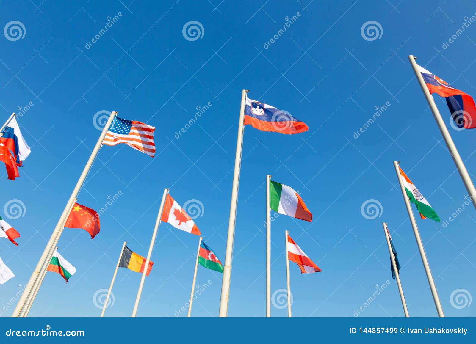 Flags of Different Countries Fluttering Agains Blue Sky Stock Image ...