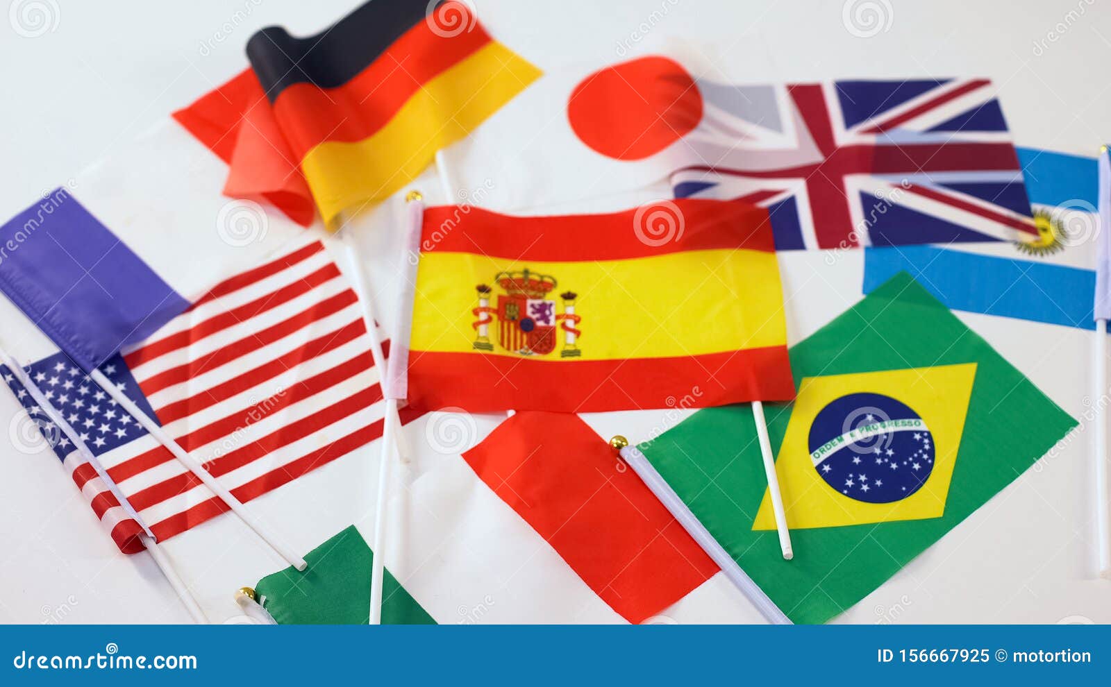 Flags of Different Countries Lying on White Table, International ...