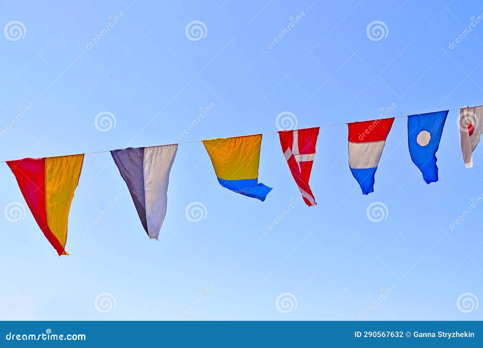 Flags of Different Countries on a Rope Against a Sky. Stock Photo ...