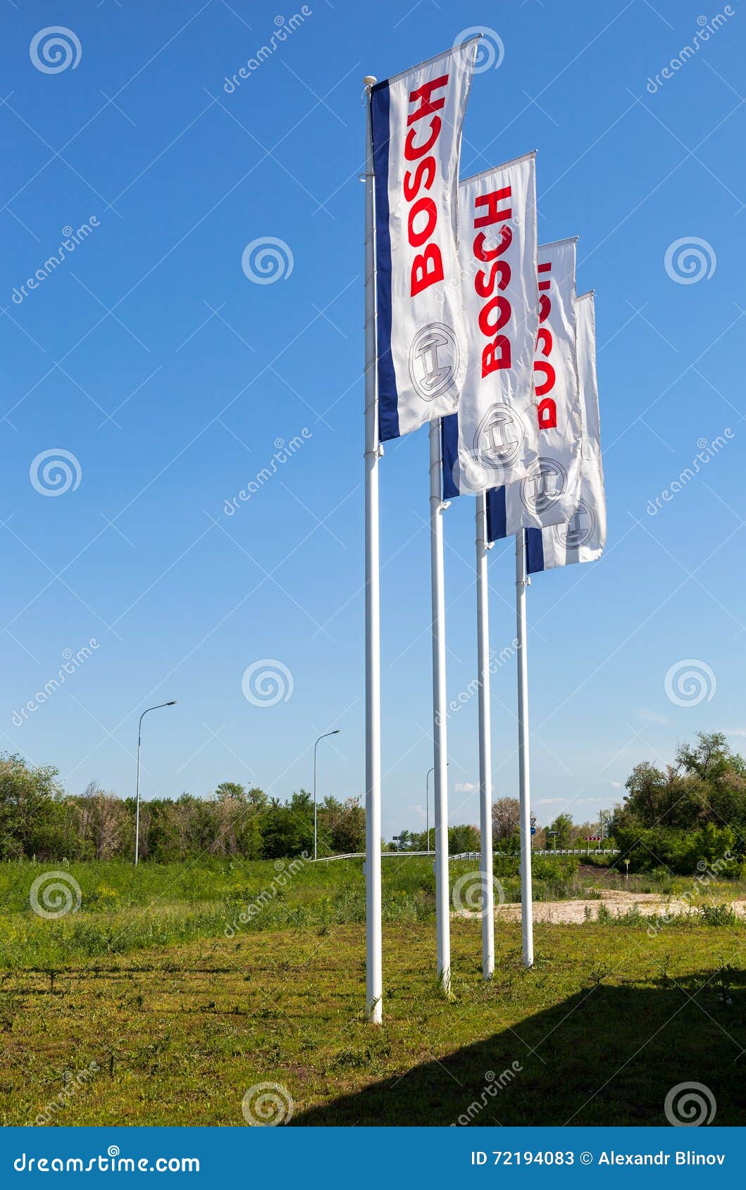 Flags with Emblem Bosch Against the Blue Sky Editorial Stock Photo ...