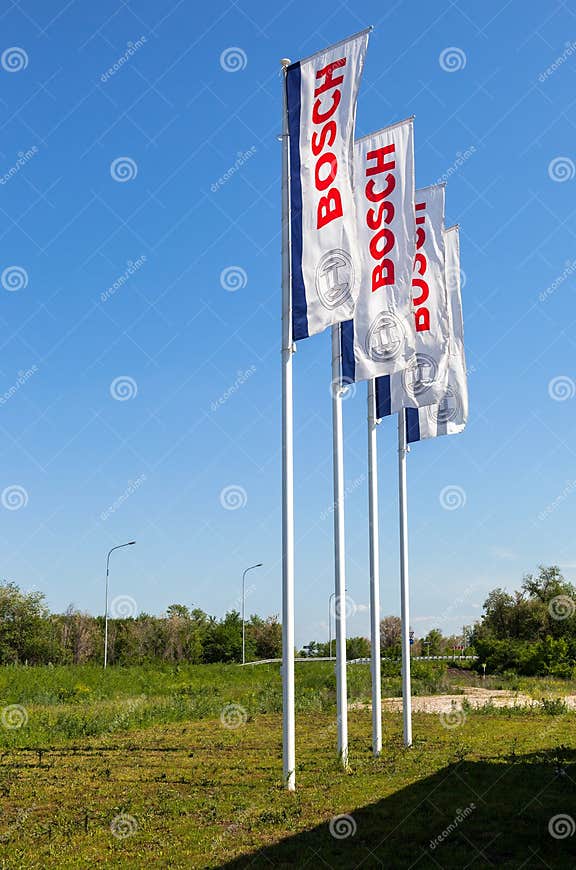 Flags with Emblem Bosch Against the Blue Sky Editorial Stock Photo ...