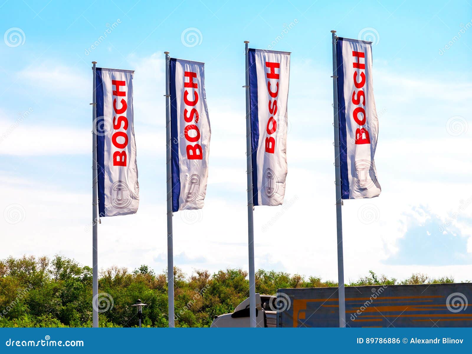 Flags with Emblem Bosch Against the Blue Sky Editorial Photo - Image of ...