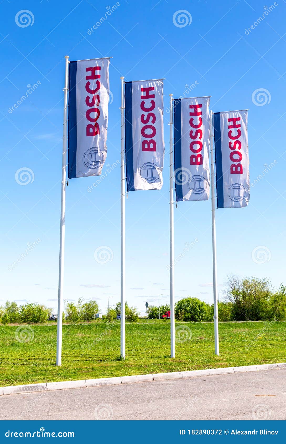Flags with Emblem Bosch Against the Blue Sky Editorial Photography ...