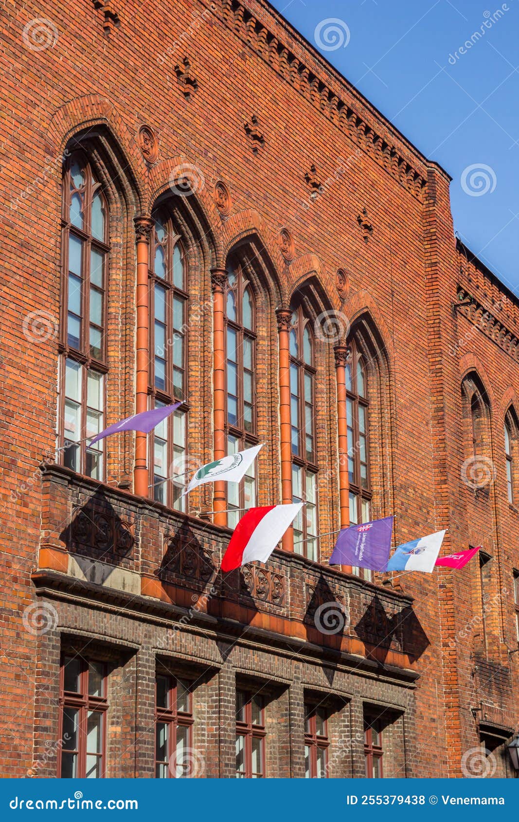 Flags on the Facade of the Copernicus School in Torun Editorial Stock ...