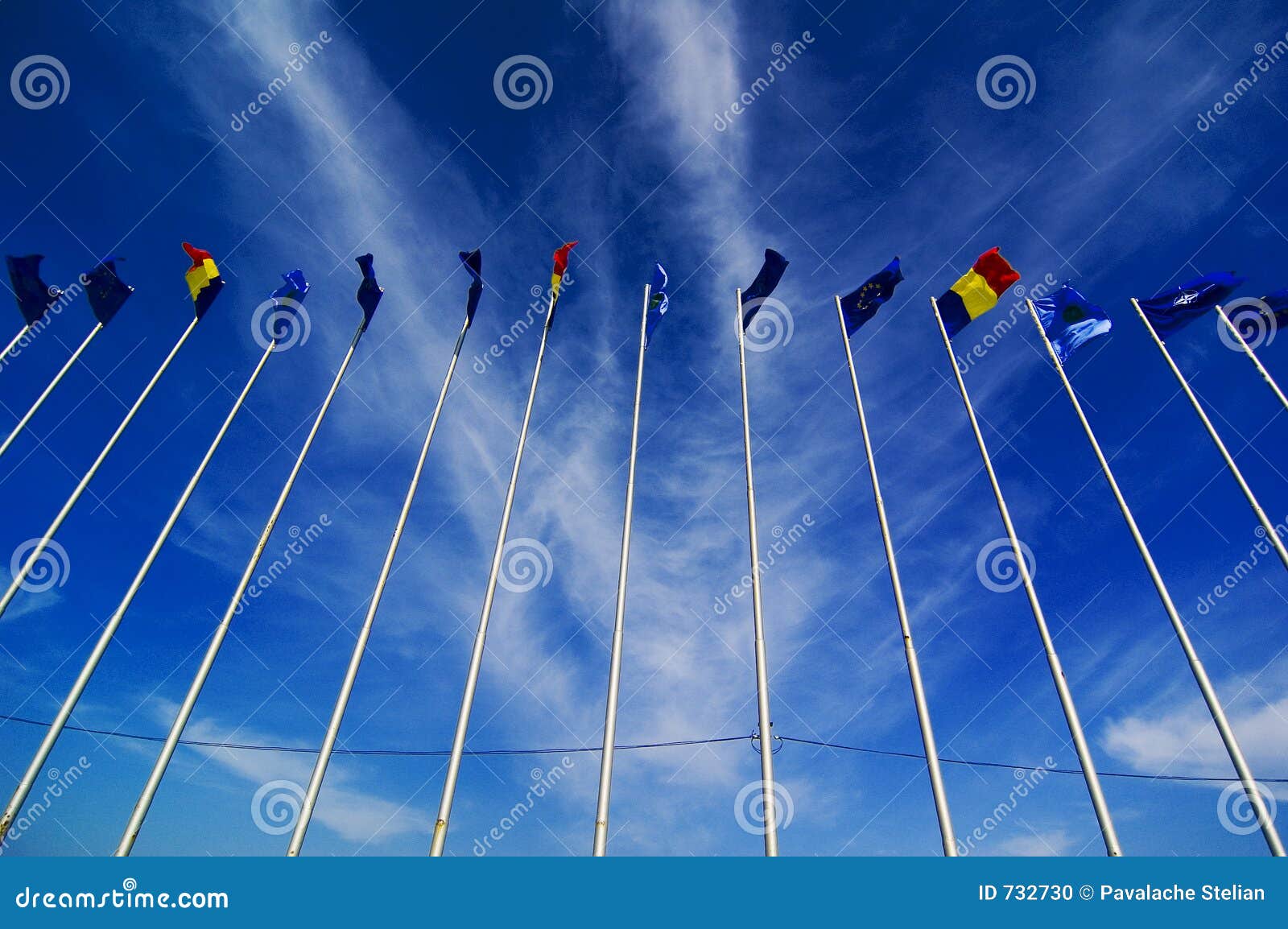 Flags flying in the breeze stock photo. Image of fair, nations - 732730