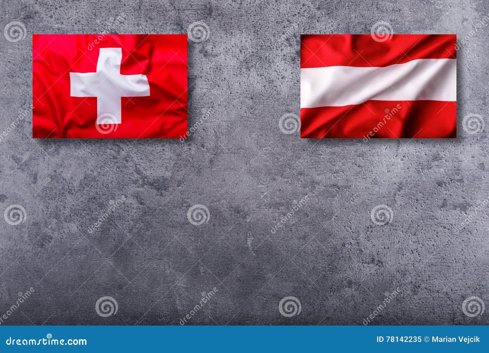 Flags of the Switzerland and Austria on Concrete Background Stock Image ...