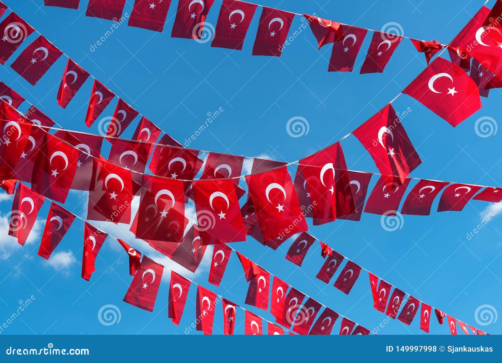 Flags of Turkey Over Blue Sky Background Stock Photo - Image of flags ...